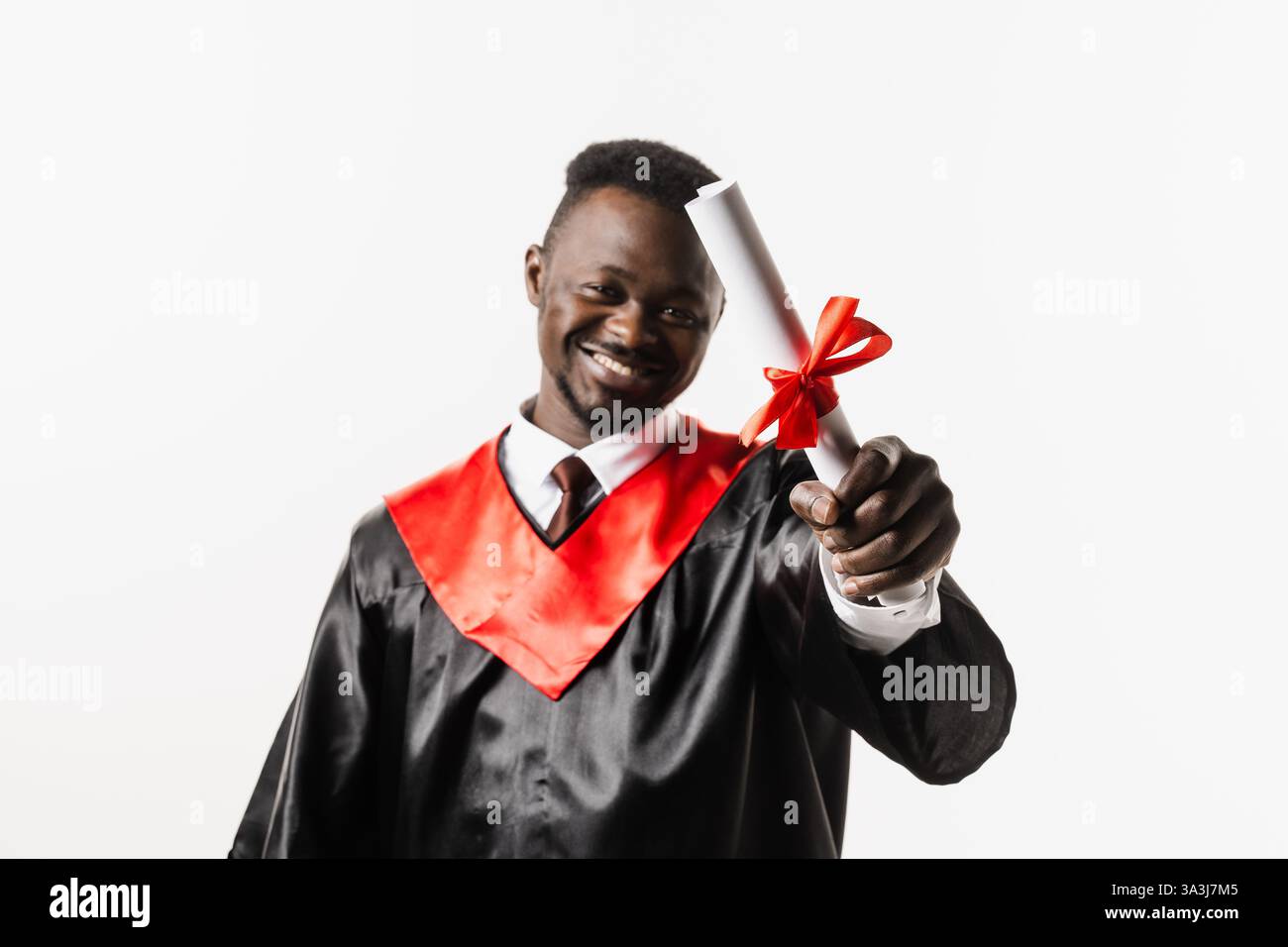 Graduate african man is graduating college and celebrating academic ...
