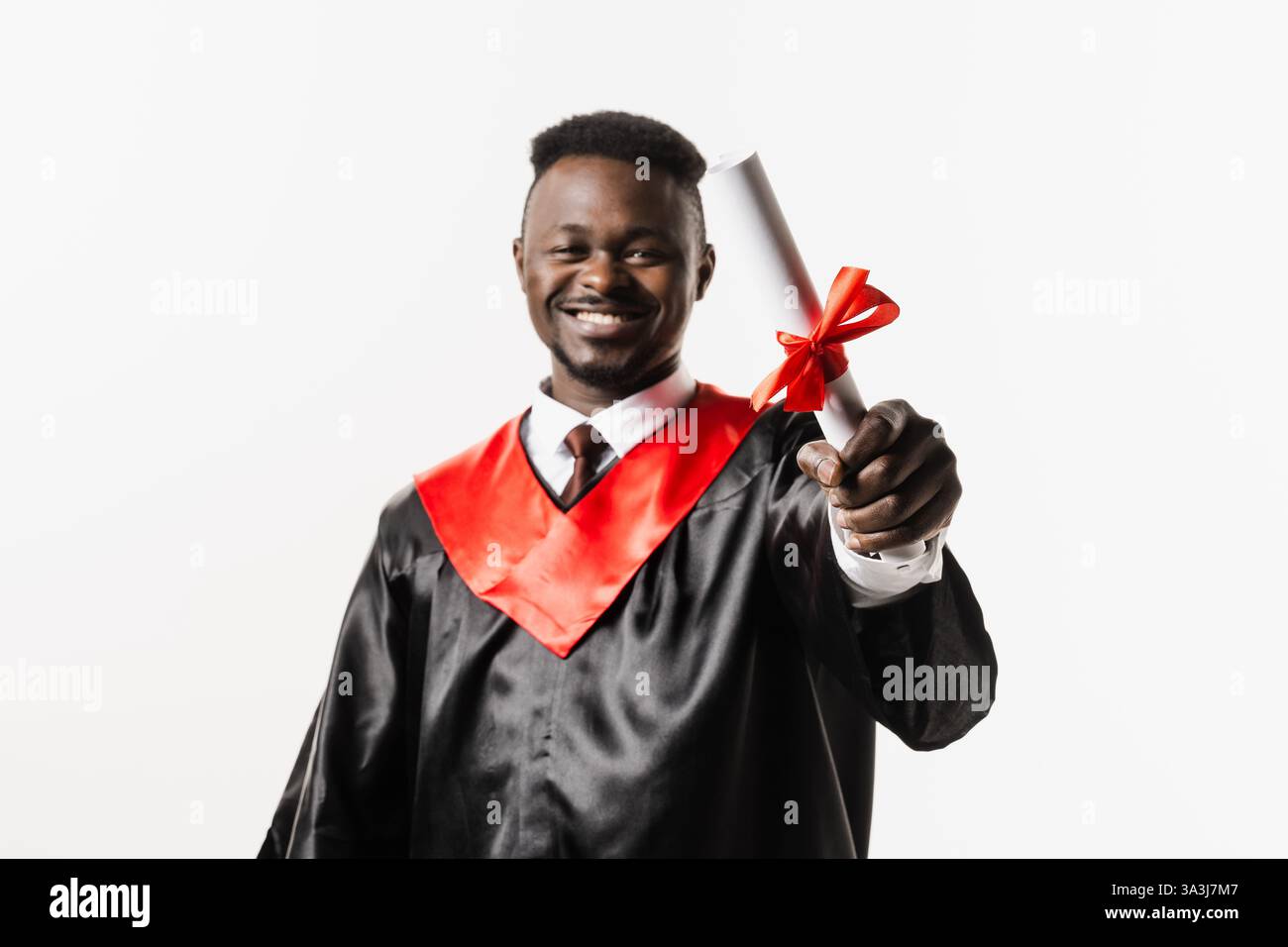 Graduate african man is graduating college and celebrating academic ...
