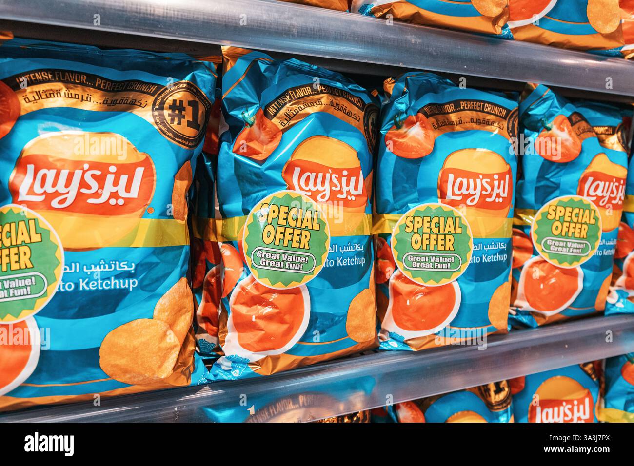 16 January 2025, Abu Dhabi, UAE: Many bags of Lays chips with ketchup ...