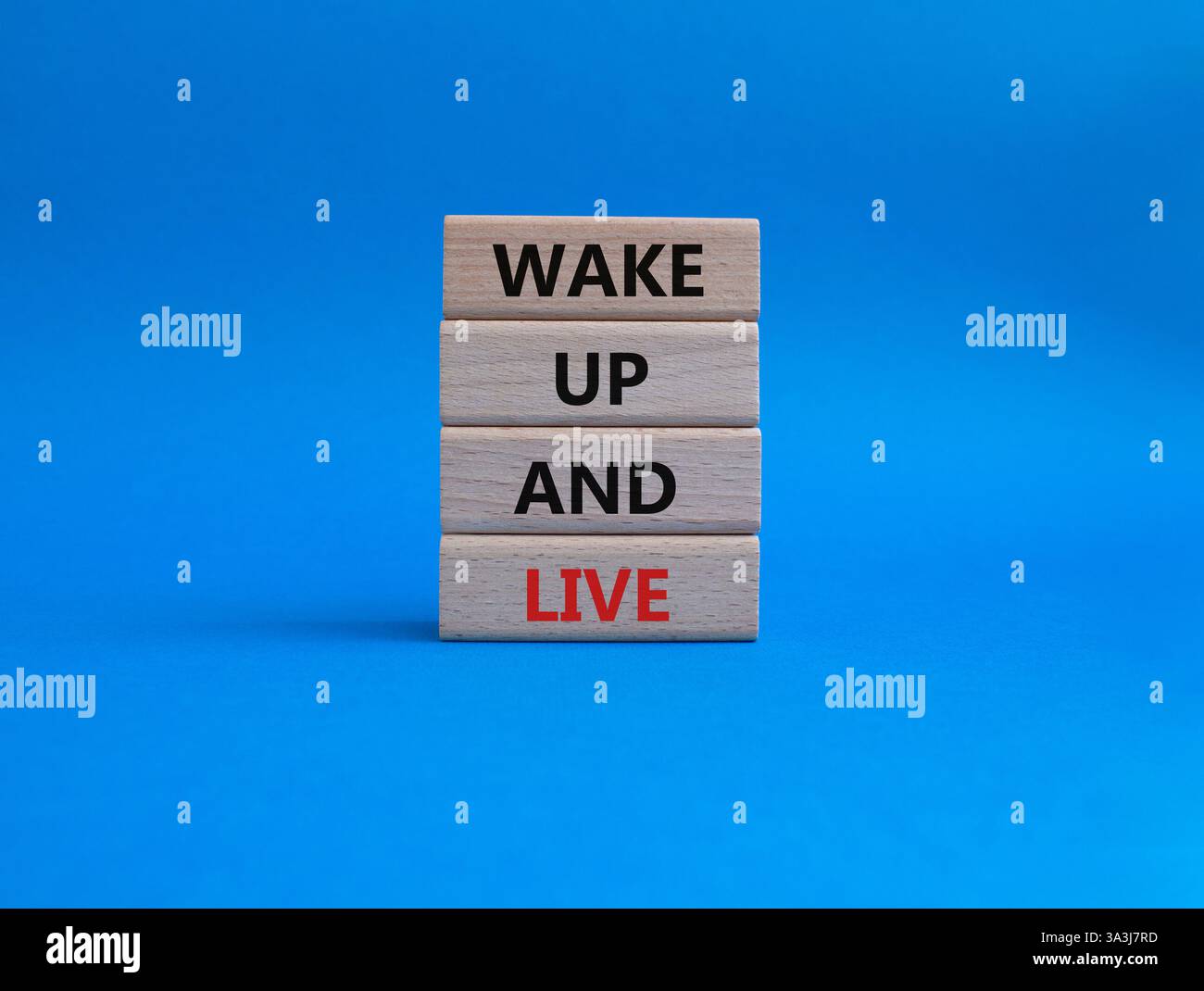 Wake up and live symbol. Wooden blocks with words Wake up and live ...