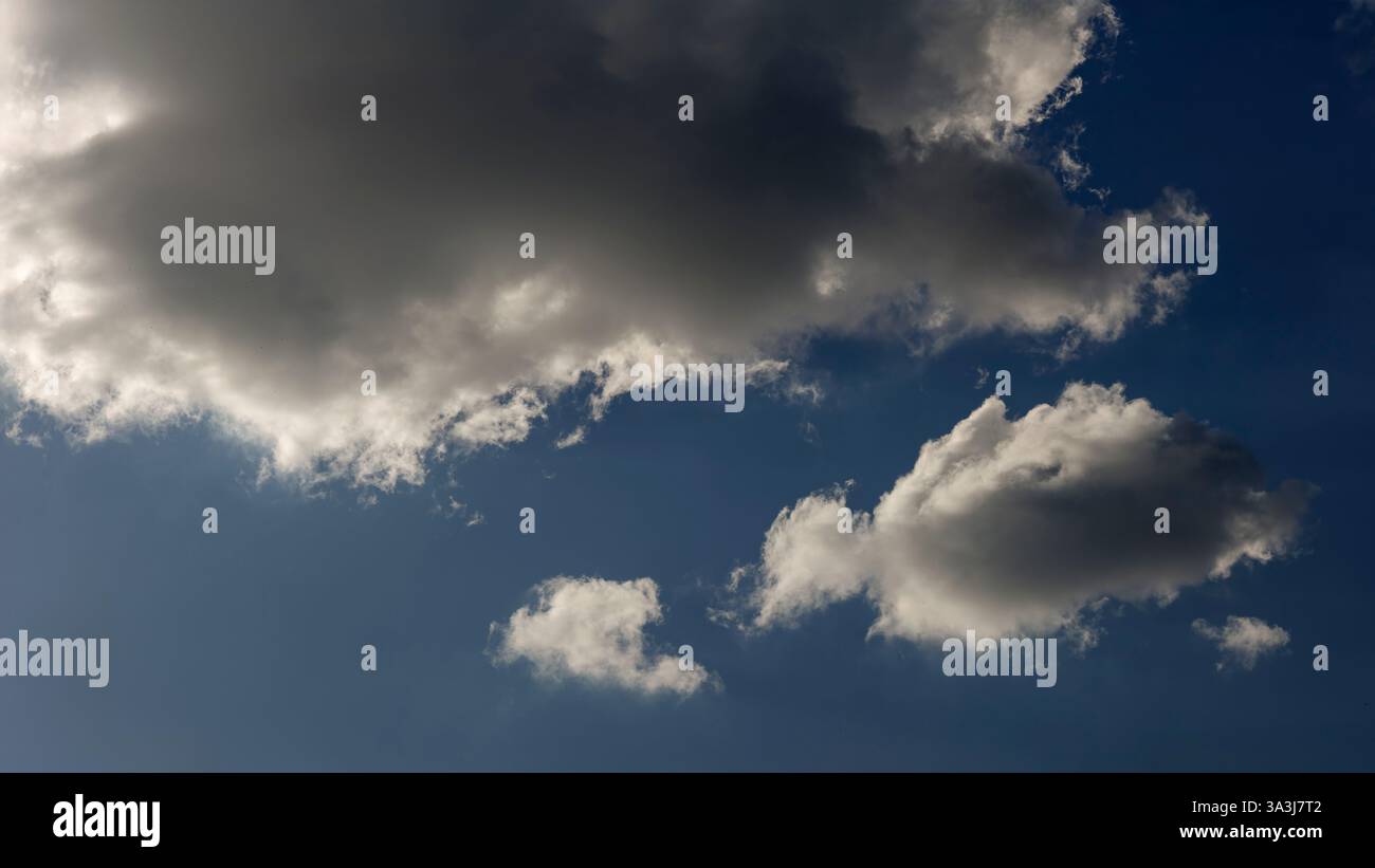 Strong clouds in a blue sky. Closeup. Panorama Stock Photo - Alamy