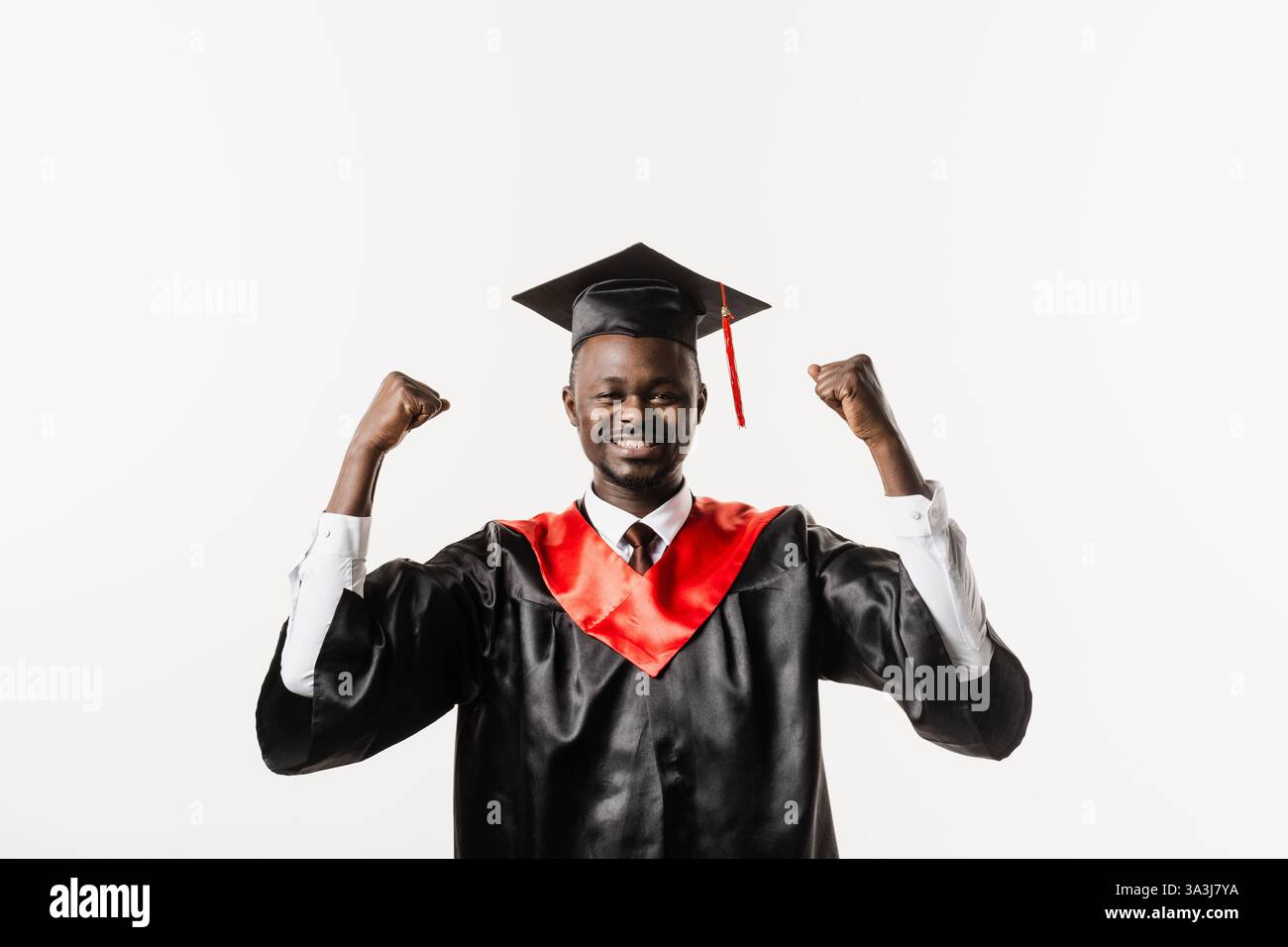 Graduate african man is graduating college and celebrating academic ...