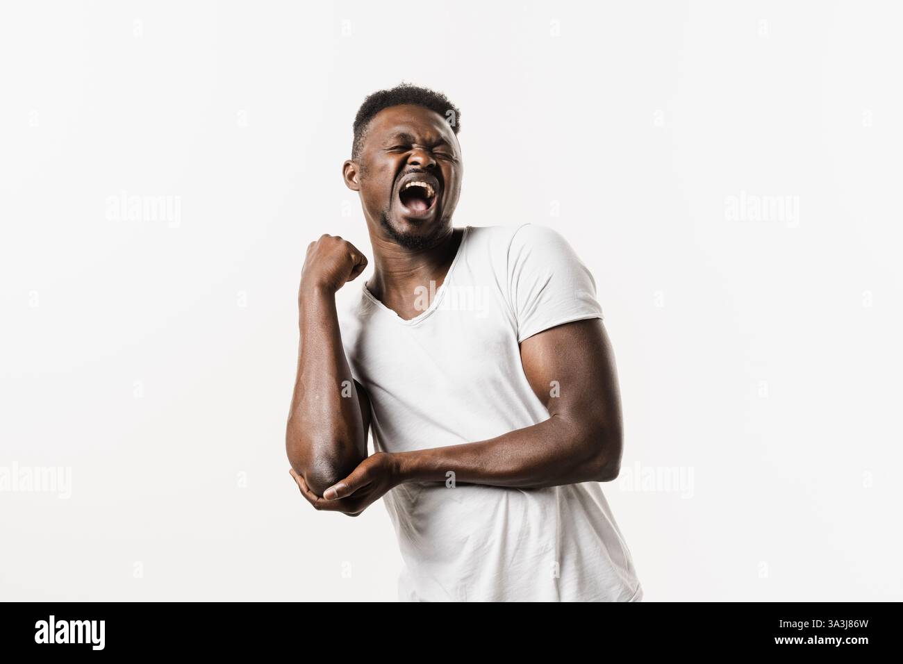 Elbow injury of african american man isolated on white background ...