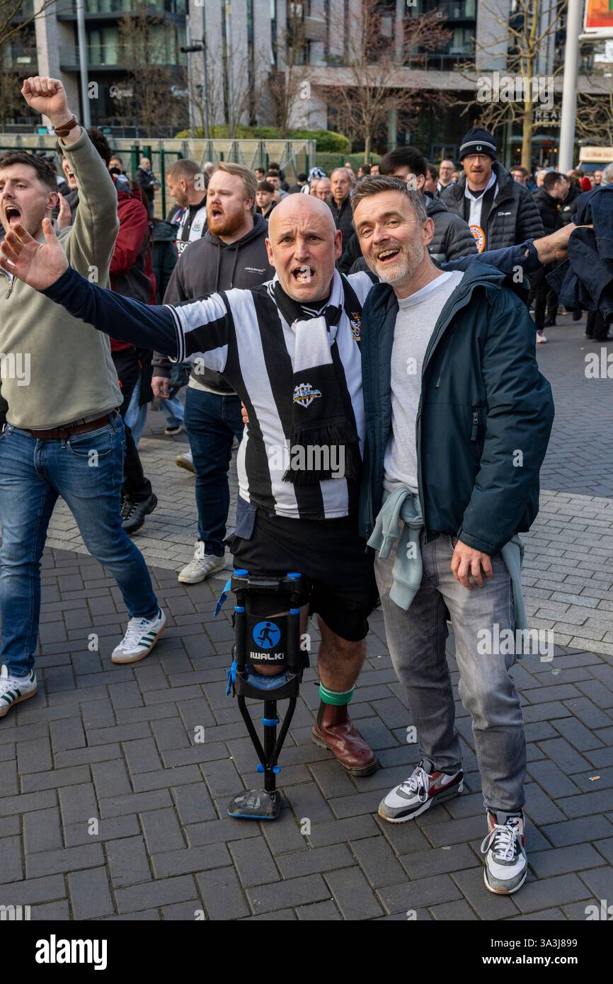 London, UK. 16 April 2025. Fans arrive on Olympic Way for Wembley ...