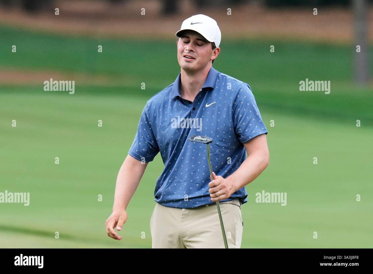 Davis Thompson reacts to his shot on the 11th green during the final ...