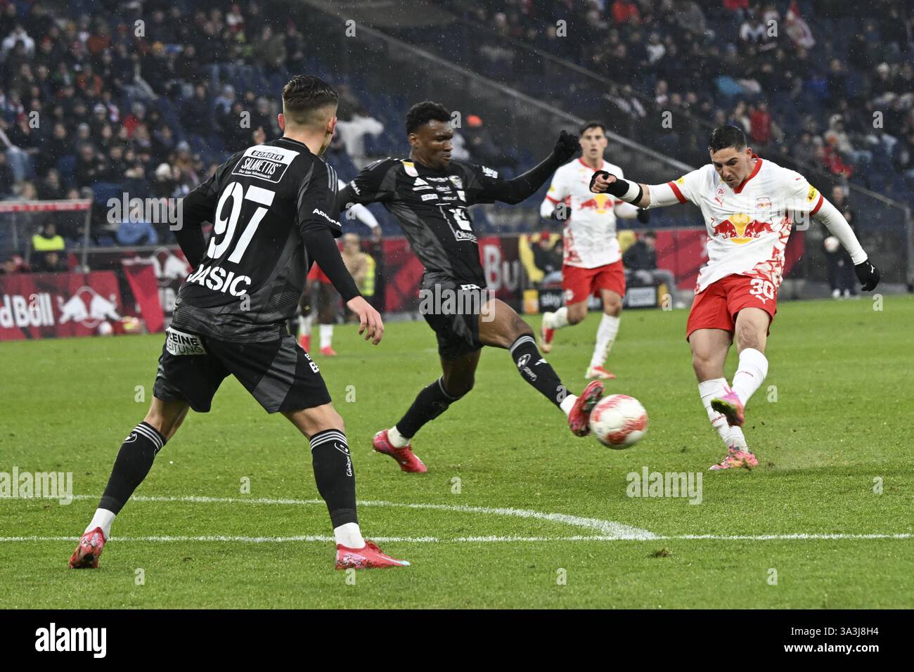 SALZBURG, AUSTRIA - MARCH 16: Chibuike Nwaiwu of Wolfsberg and Oscar ...