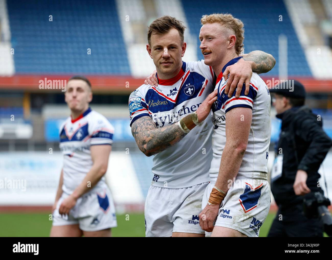 Wakefield Trinity's Tom Johnstone (left) and Lachlan Walmsley celebrate ...