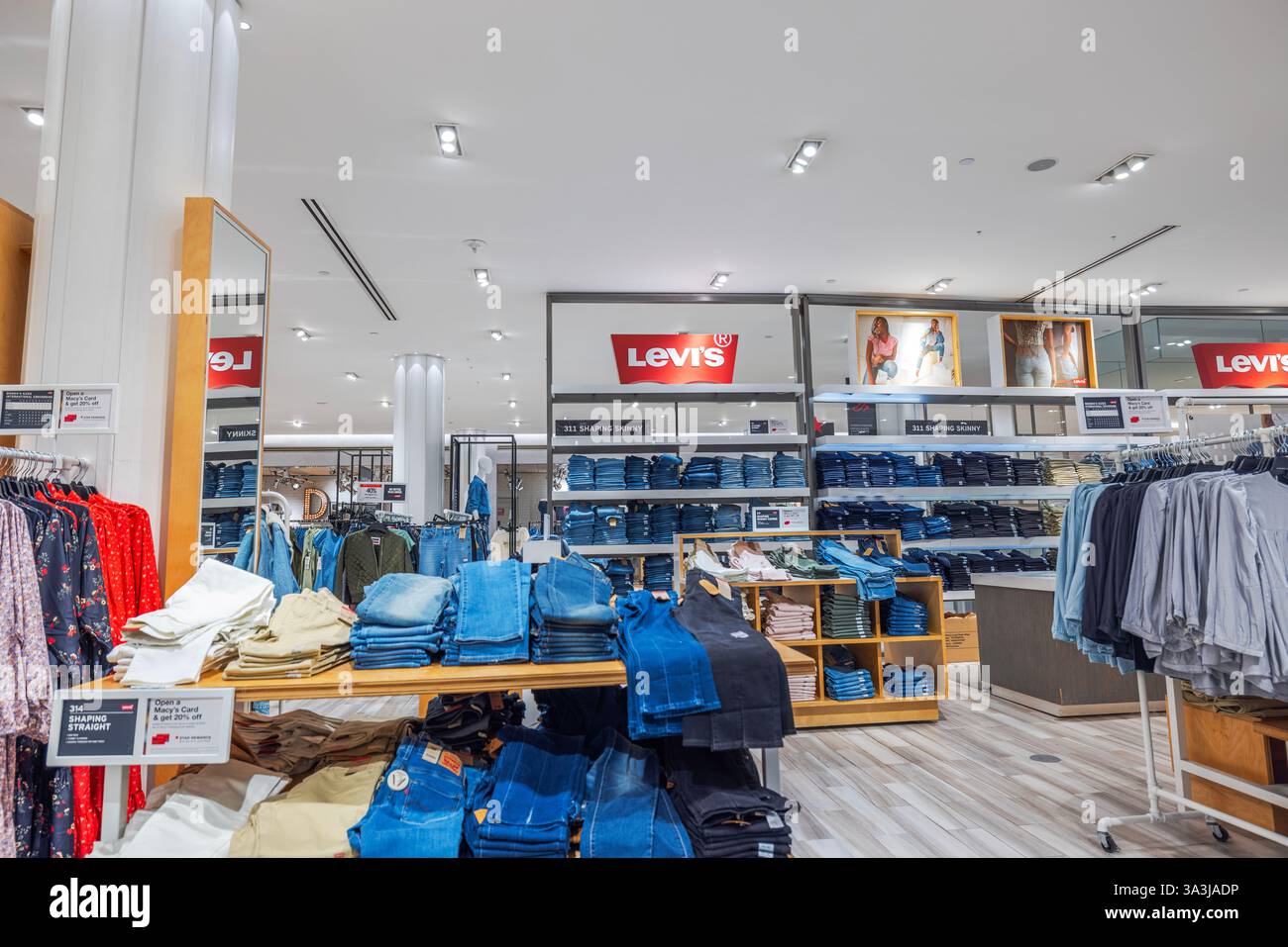 Levis clothing display with denim jeans and apparel in Macys department ...