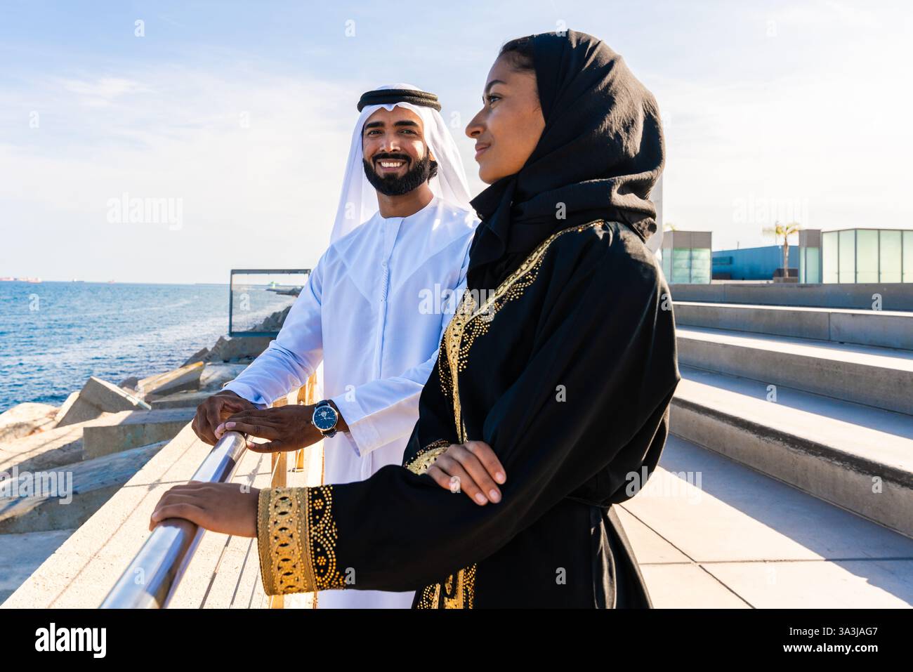 Traditional arab couple wearing emirati clothing dating outdoors - Middle-eastern married woman ...