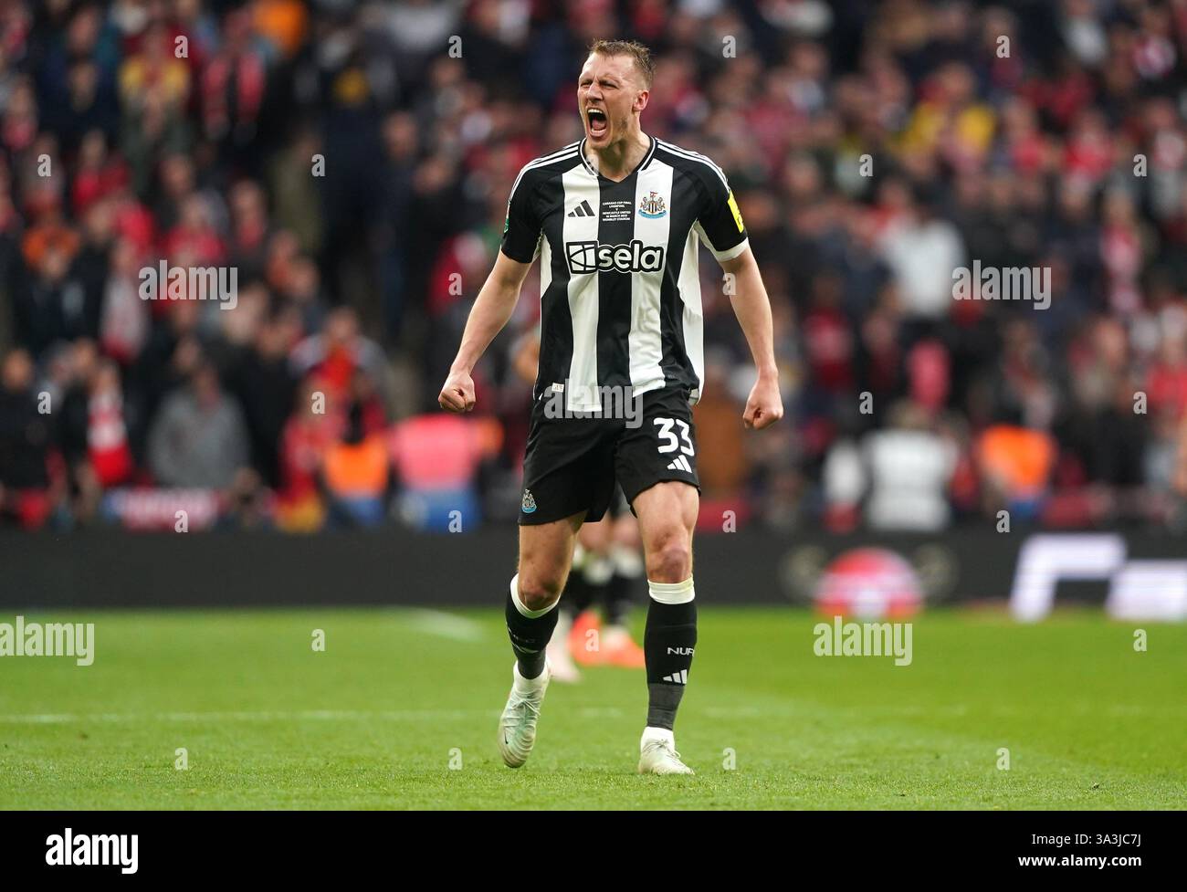 Newcastle United's Dan Burn celebrates scoring their side's first goal ...