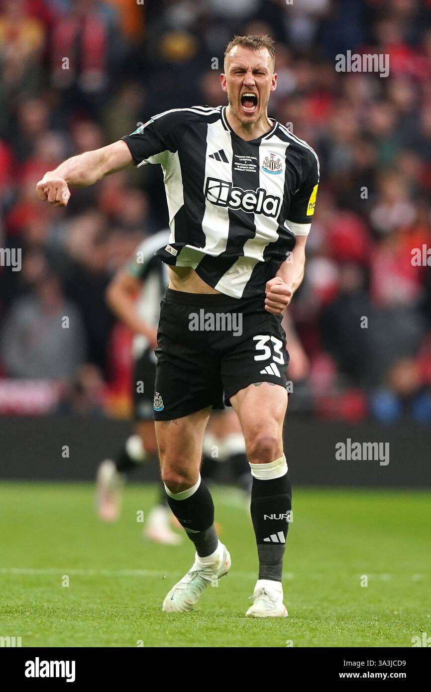 Newcastle United's Dan Burn celebrates scoring their side's first goal ...