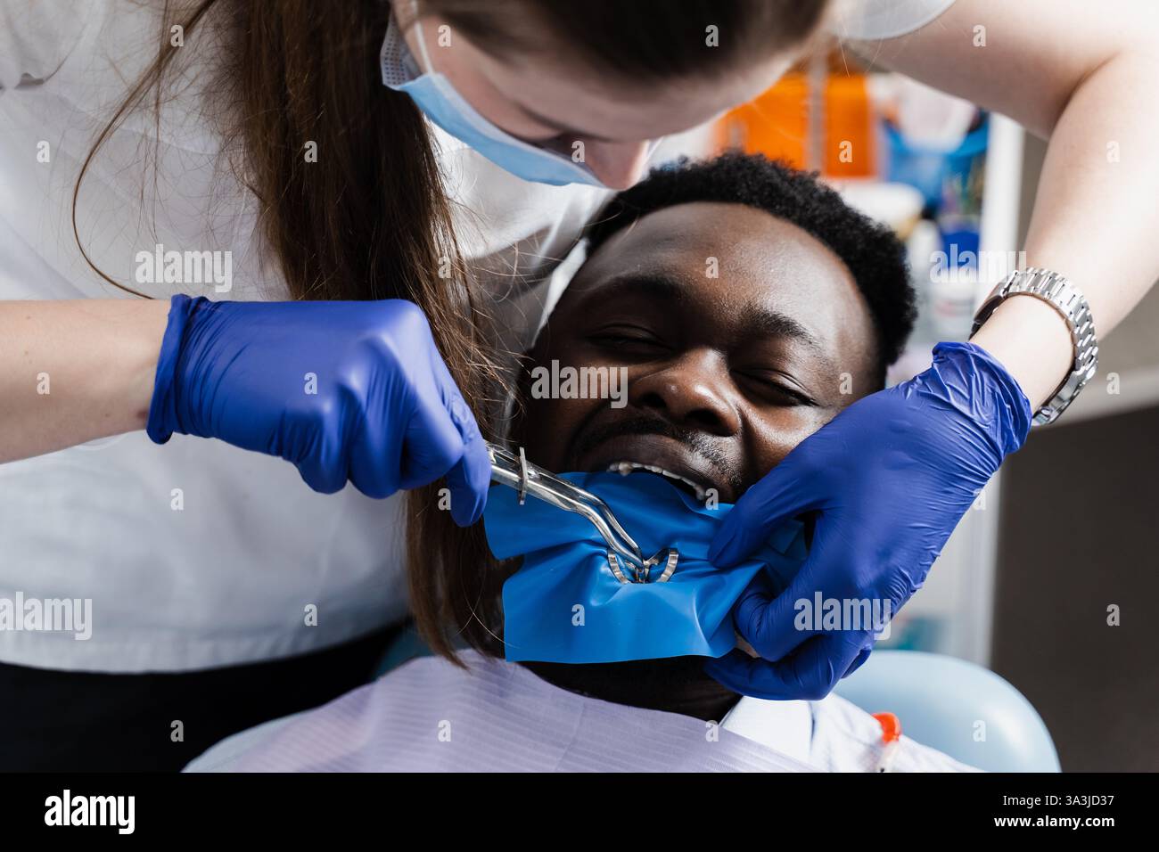 Process installing dental cofferdam treatment hi-res stock photography ...