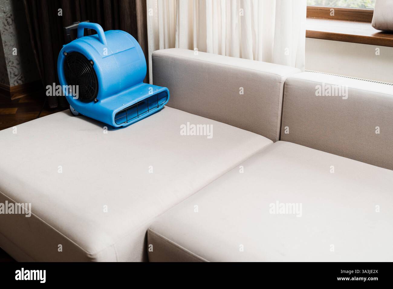Process of drying sofa using floor dryer blower fan machine. Floor ...