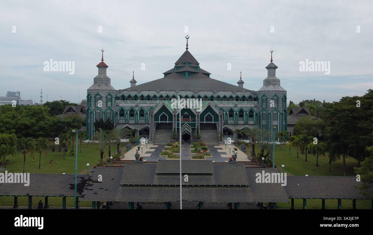 A symmetrical front view of Al Markaz Al Islami Mosque in Makassar ...