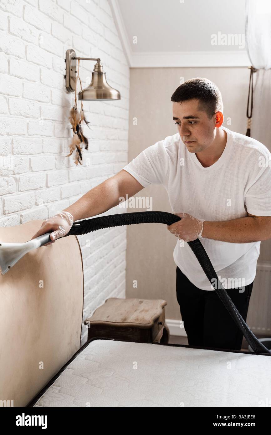 Process of extraction dirt from headboard of bed using extractor ...