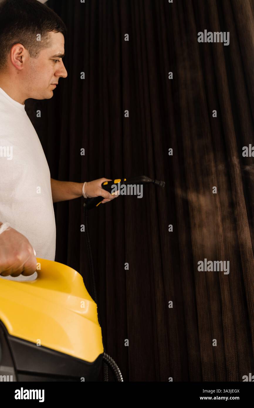Curtains steam cleaning process. Disinfection and dry cleaning of ...