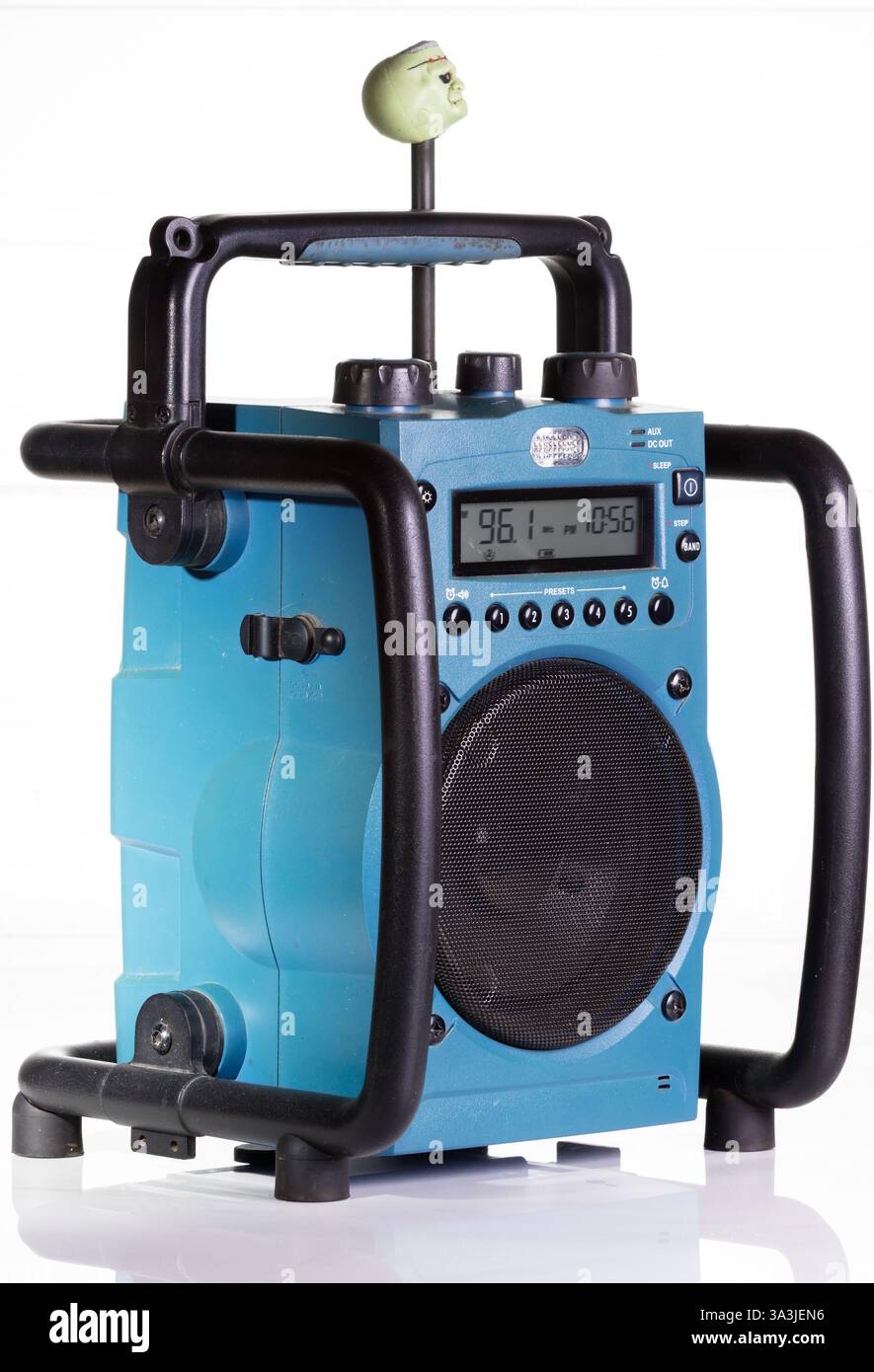 Compact blue radio with visible controls, durable build, and front ...