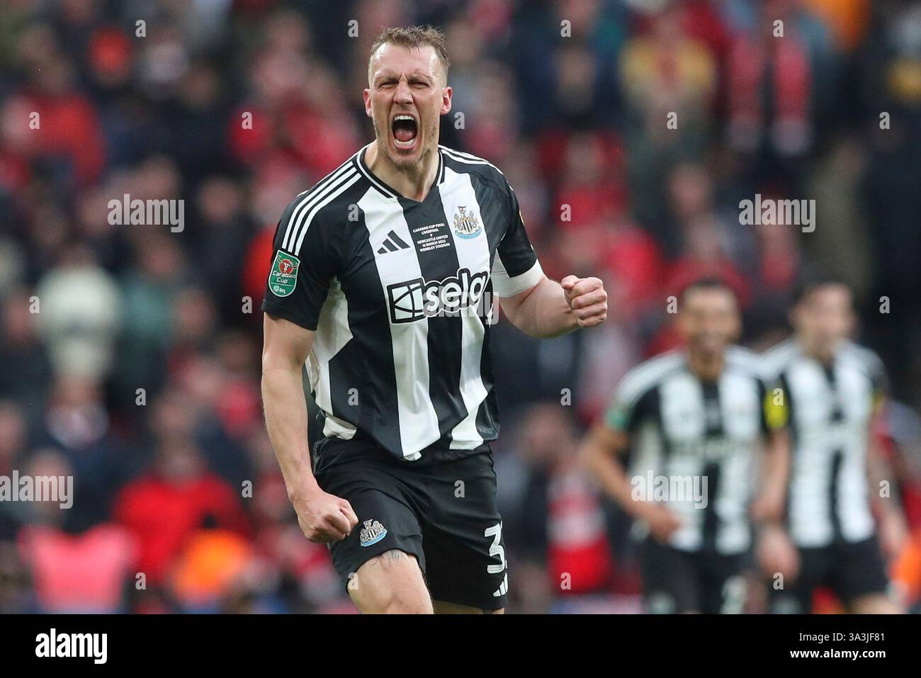 Newcastle's Dan Burn celebrates after scoring the opening goal during ...