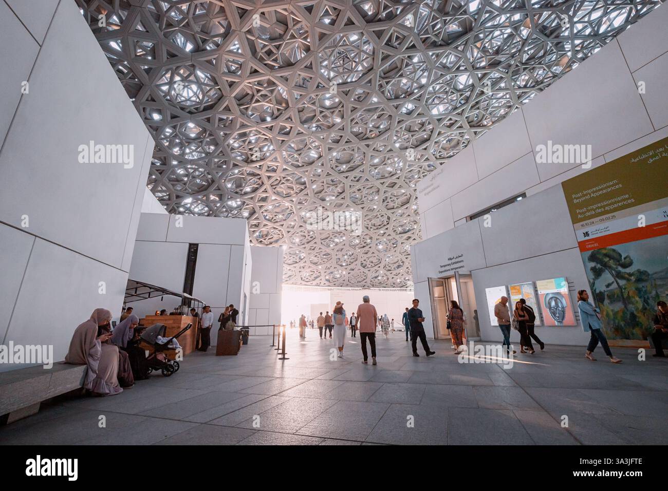 17 January 2025, Louvre museum Abu Dhabi, UAE: Tourists walking inside ...