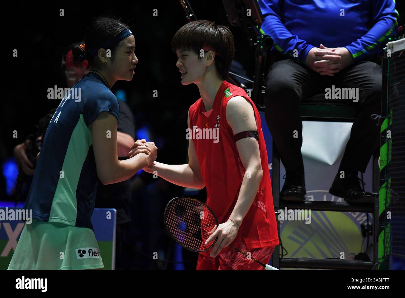 South Korea's Young An Se, left, greets her opponent China's Wang Zhi Yi after defeating her in ...