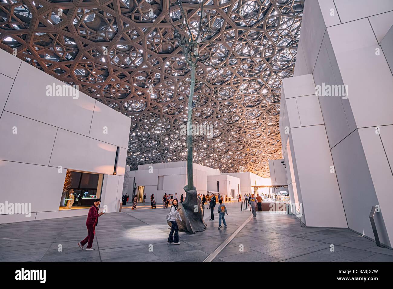 17 January 2025, Louvre museum Abu Dhabi, UAE: Tourists walking inside ...