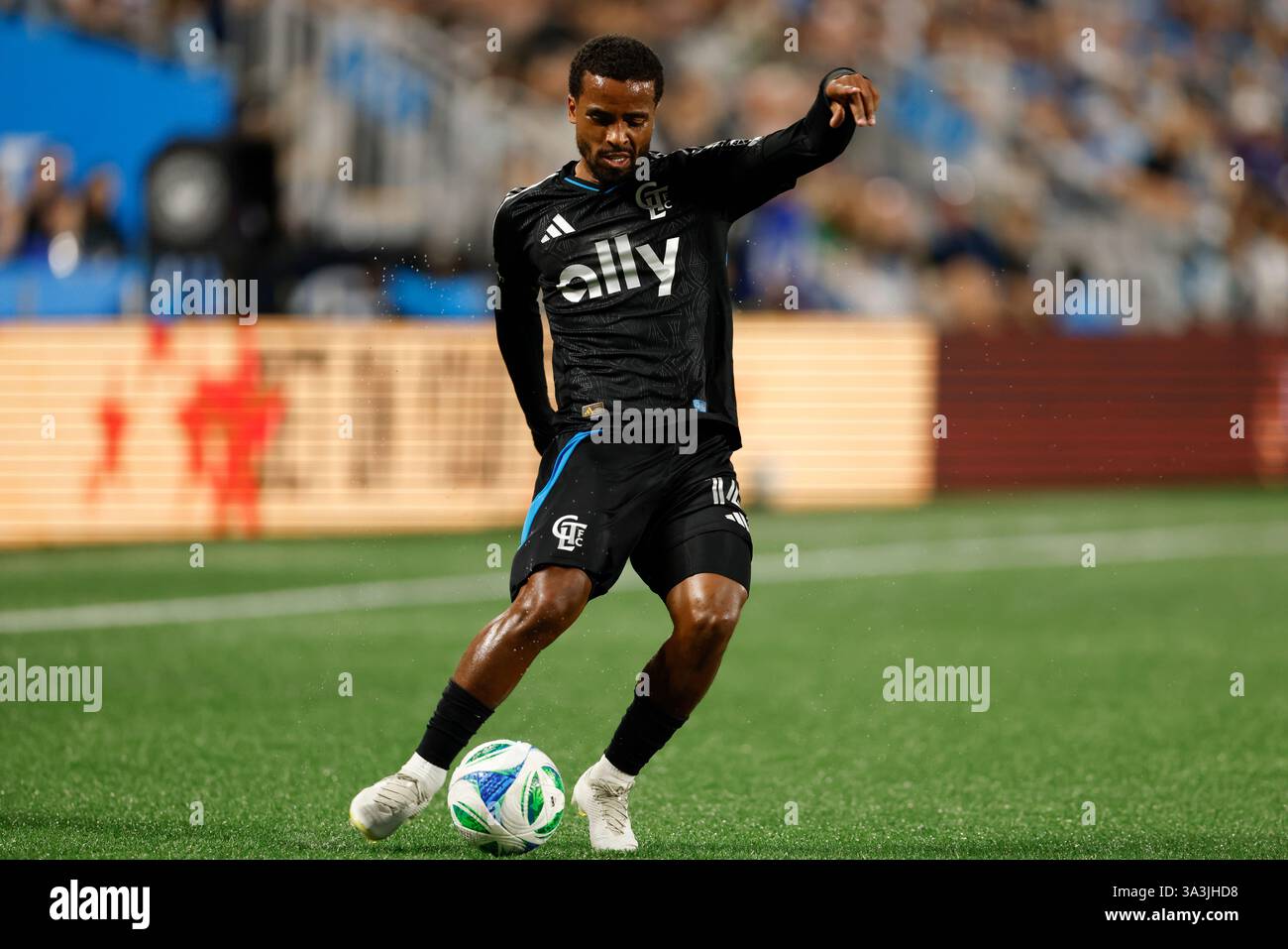 Charlotte FC defender Nathan Byrne moves the ball during an MLS soccer ...