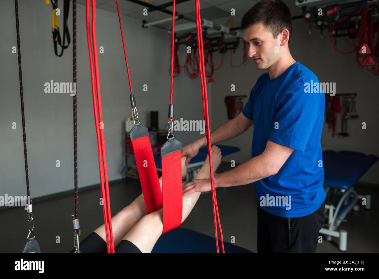 Activation of back muscles after injury with sling system red cord. Red ...