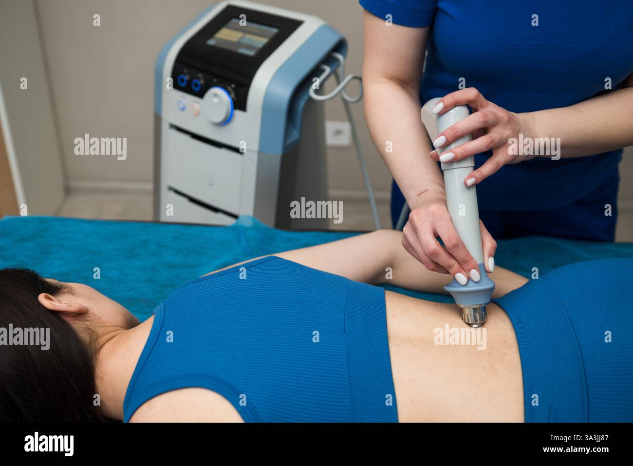 Treating back injury with extracorporeal shock wave therapy. Use of a ...