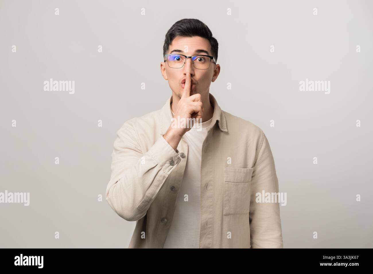 It's a secret. A mysterious and intriguing man in eyeglasses and a ...