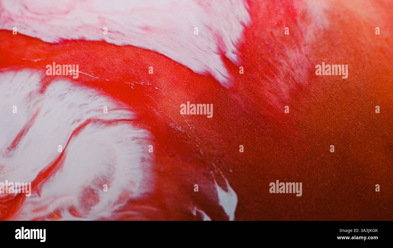 Ink stream. Wet texture. Defocused red crimson white colorful water ...