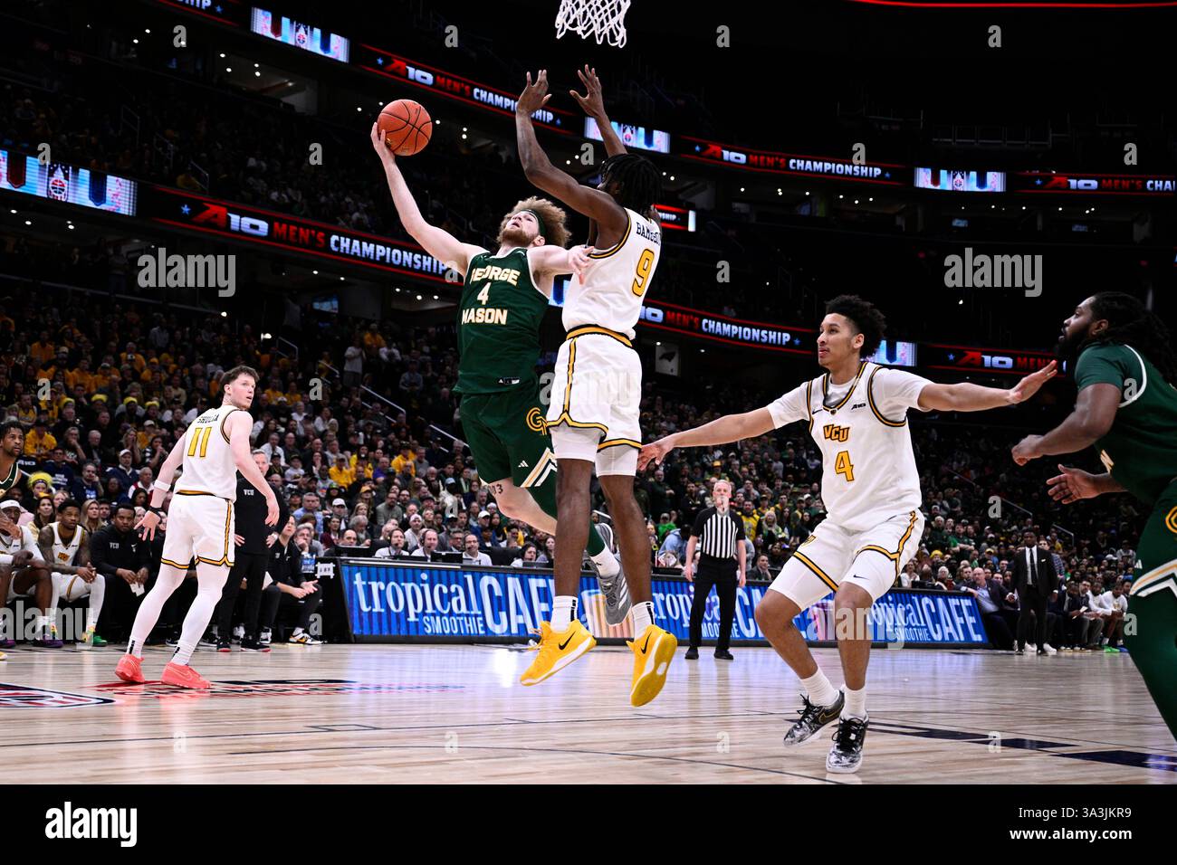 George Mason guard Brayden O'Connor (4) goes to the basket against ...
