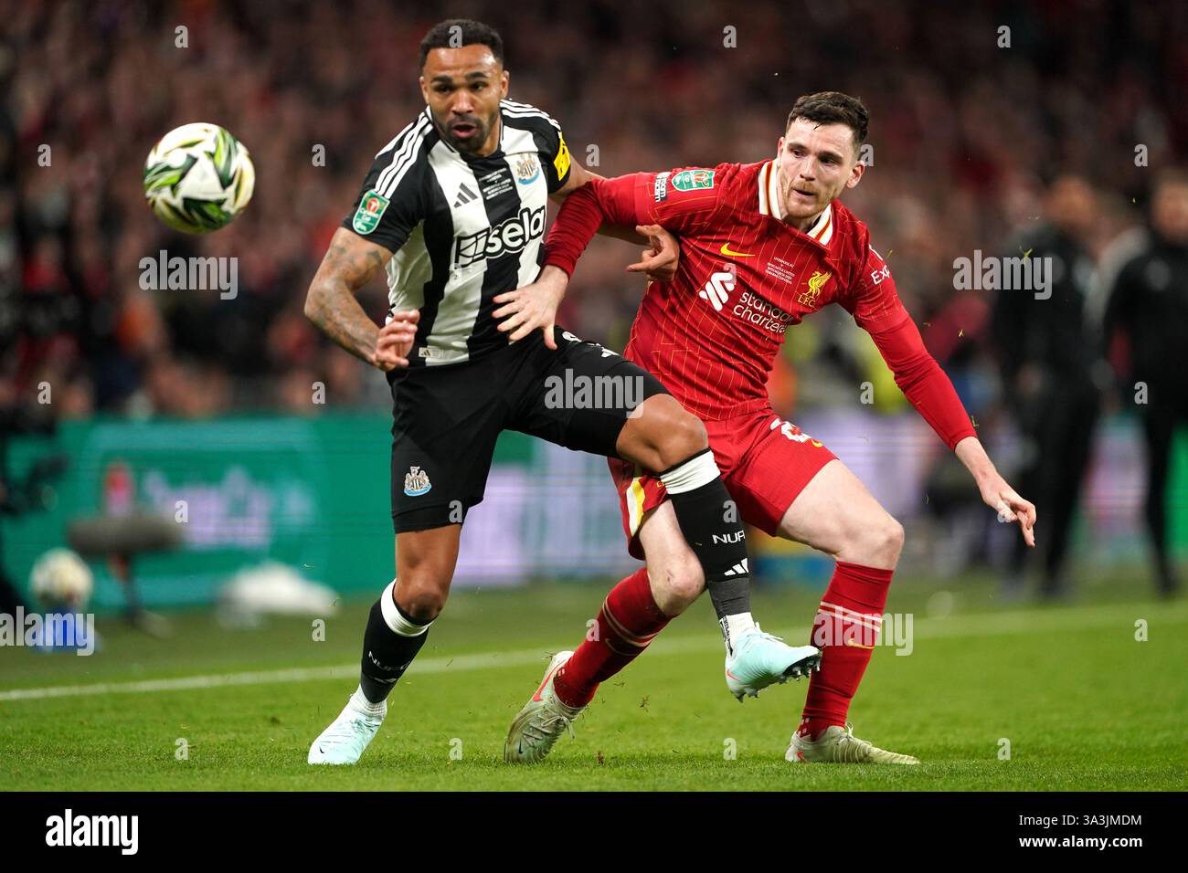Newcastle United's Callum Wilson (left) and Liverpool's Andrew ...