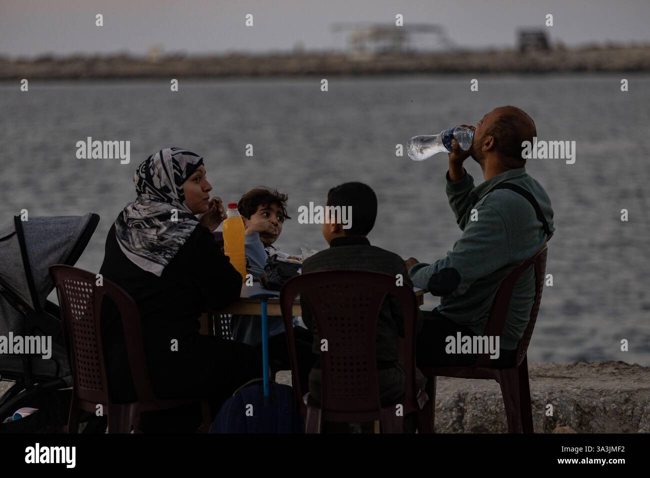 March 16, 2025, Gaza, Gaza, Palestine: Palestinians eat their iftar ...