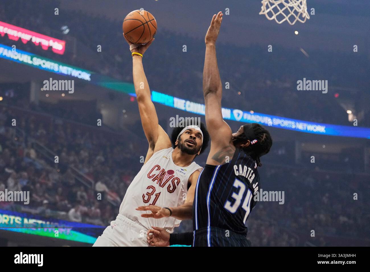 Cleveland Cavaliers center Jarrett Allen (31) shoots as Orlando Magic center Wendell Carter Jr ...