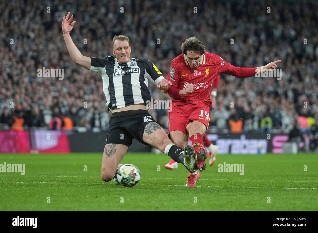 Liverpool's Federico Chiesa, right, scores his side's opening goal ...