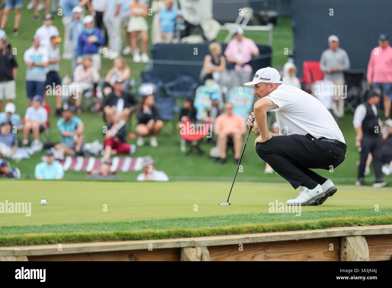 Ponte Vedra, FL, USA. 16th Mar, 2025. Shane Lowry sizes up his putt on ...