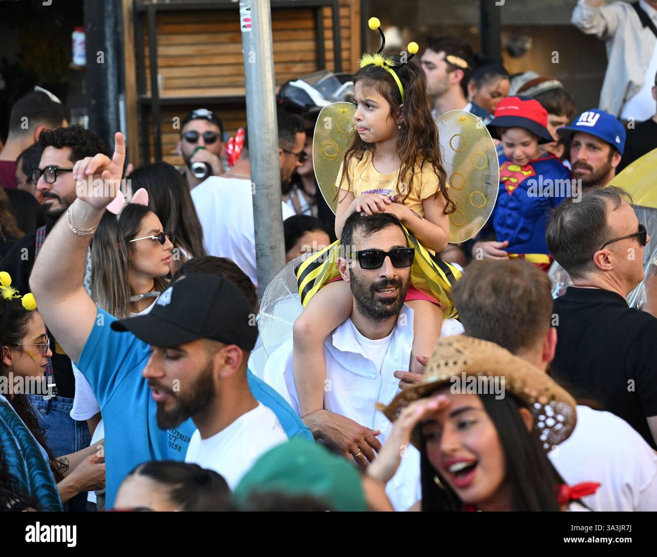 Jerusalem, Israel. 16th Mar, 2025. An Israeli girl wears a bee costume ...