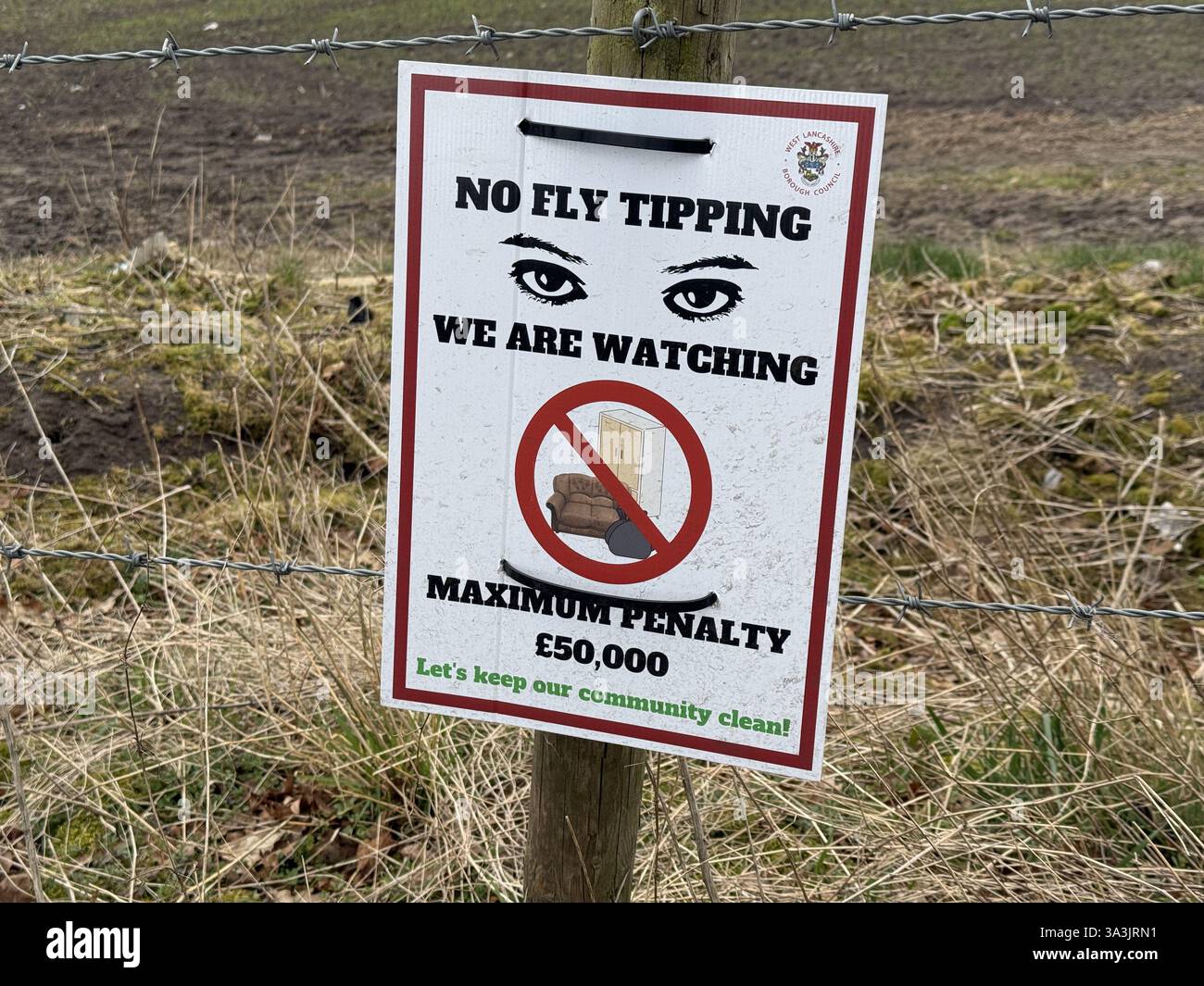 No Fly Tipping warning sign in a country lane lay-by in rural ...
