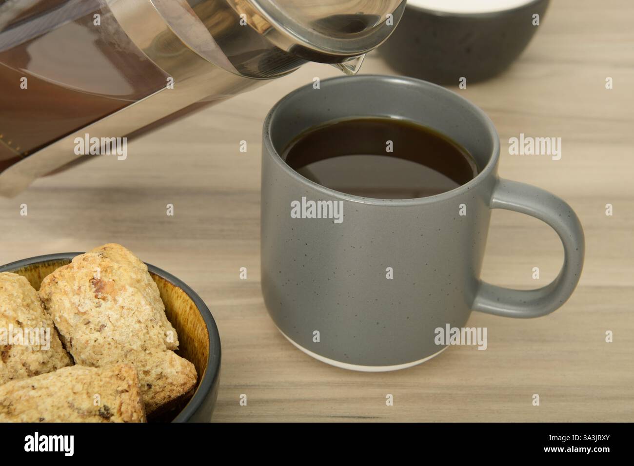 Enjoy hot drink, pouring plunge coffee into mug, morning beverage with ...