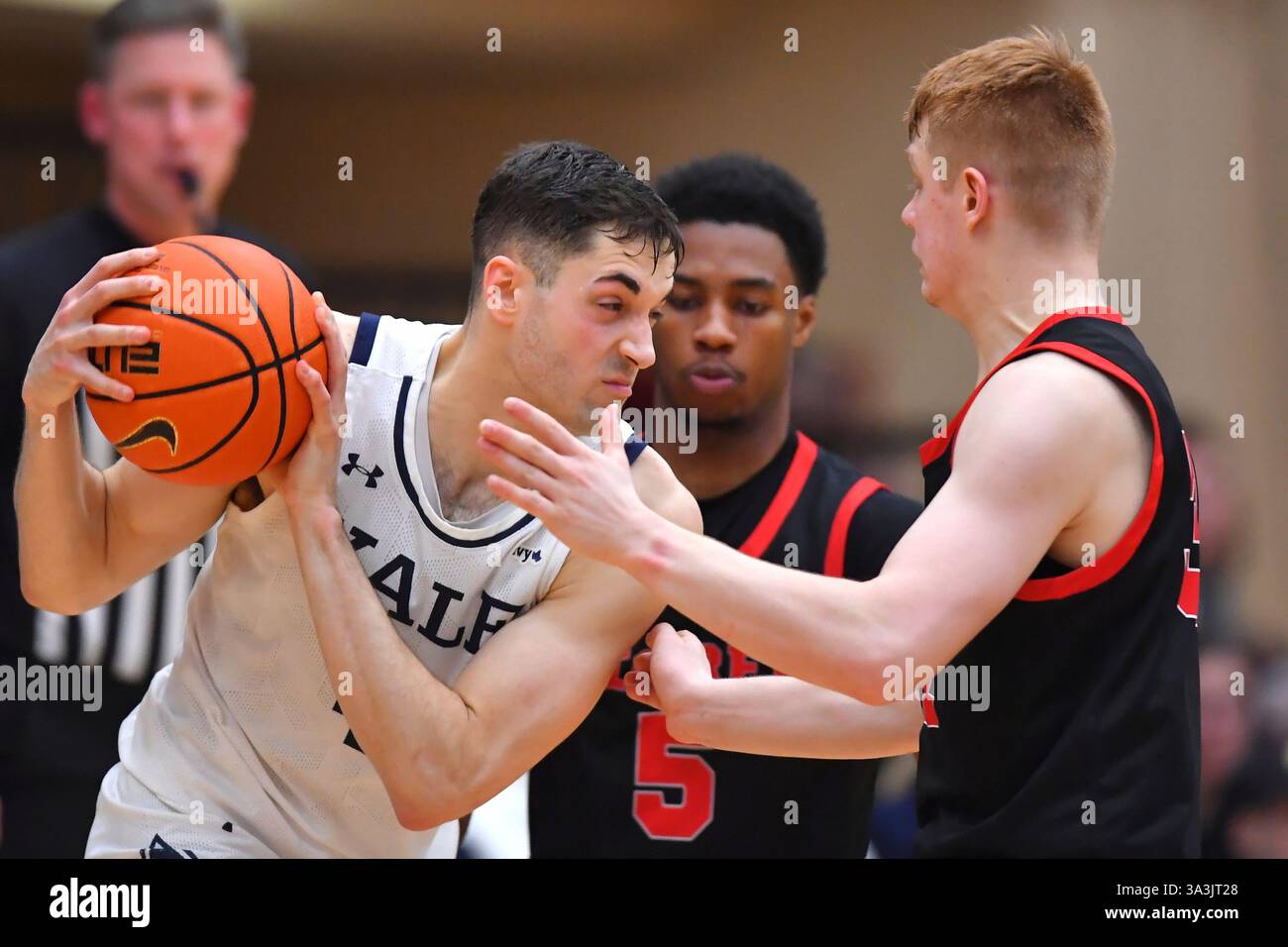 Cornell forward Gioacchino Panzini, left, looks for an opening as ...