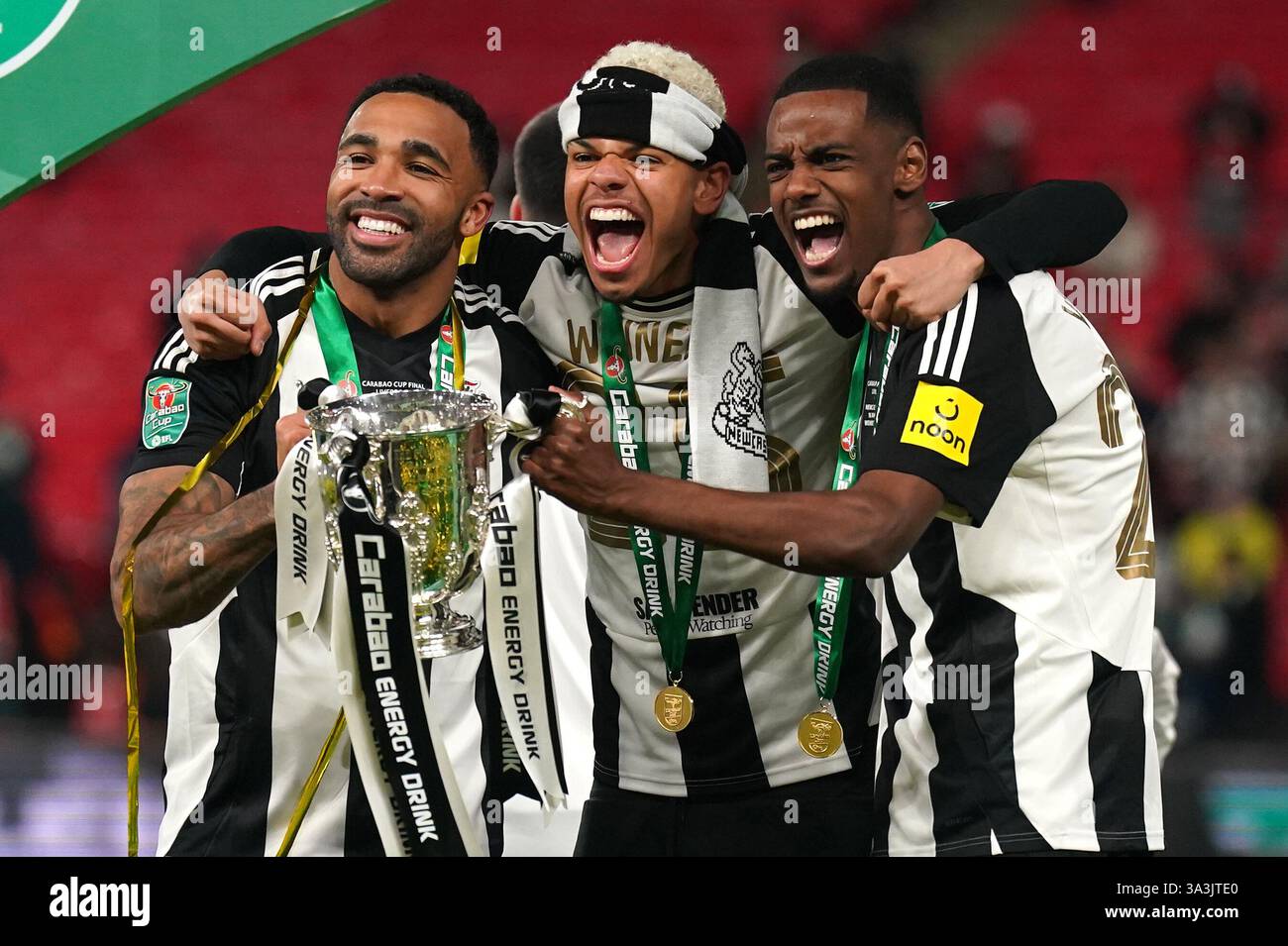 Newcastle United's Callum Wilson, William Osula and Alexander Isak celebrate with the trophy ...