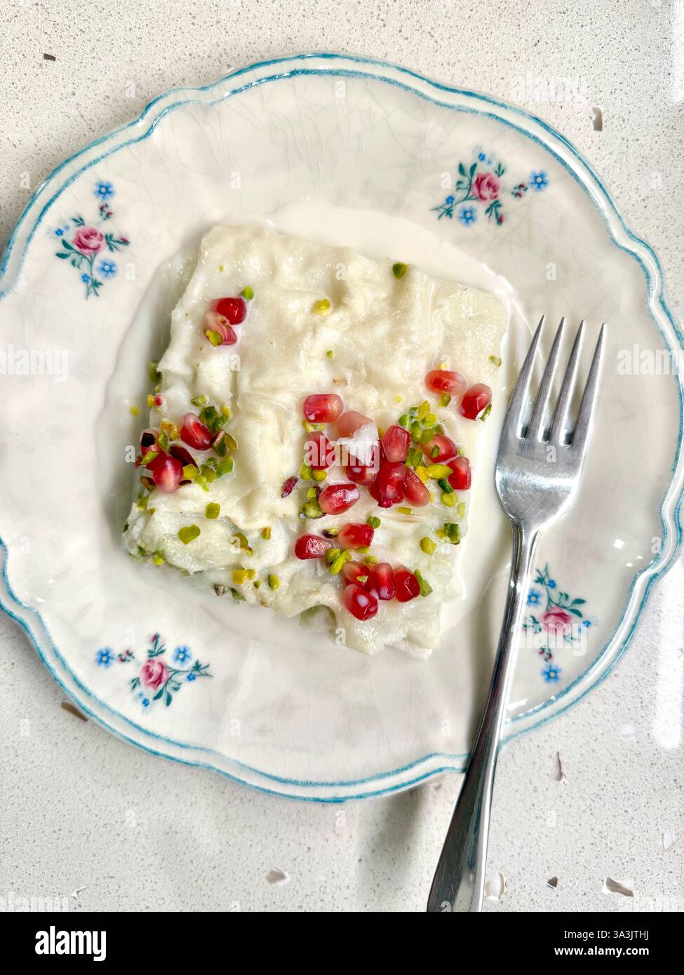 Turkish Traditional Ramadan Dessert Gullac with pomegranate seeds Stock ...