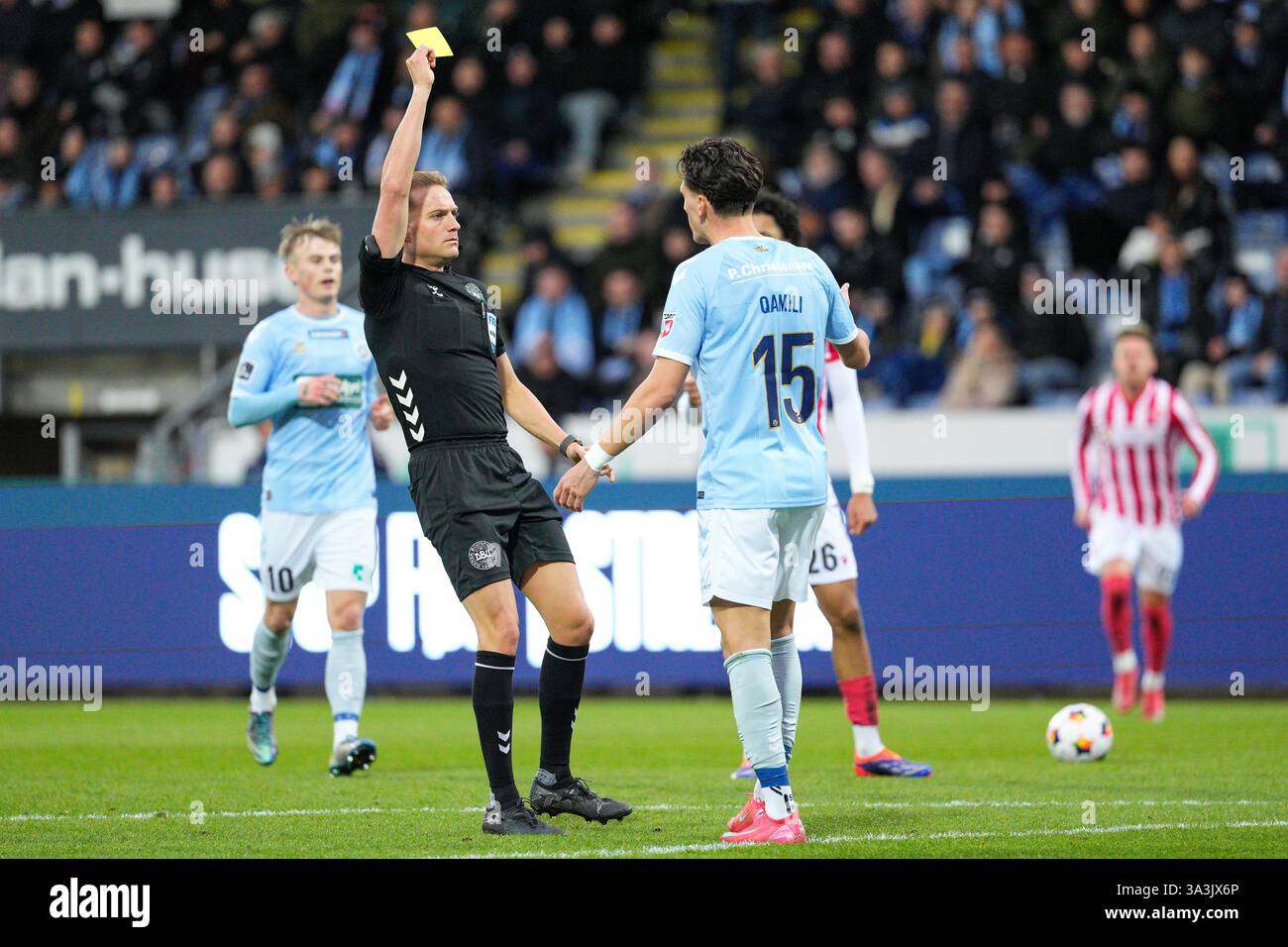 Haderslev, Denmark. 16th Mar, 2025. Referee Mikkel Redder gives a ...