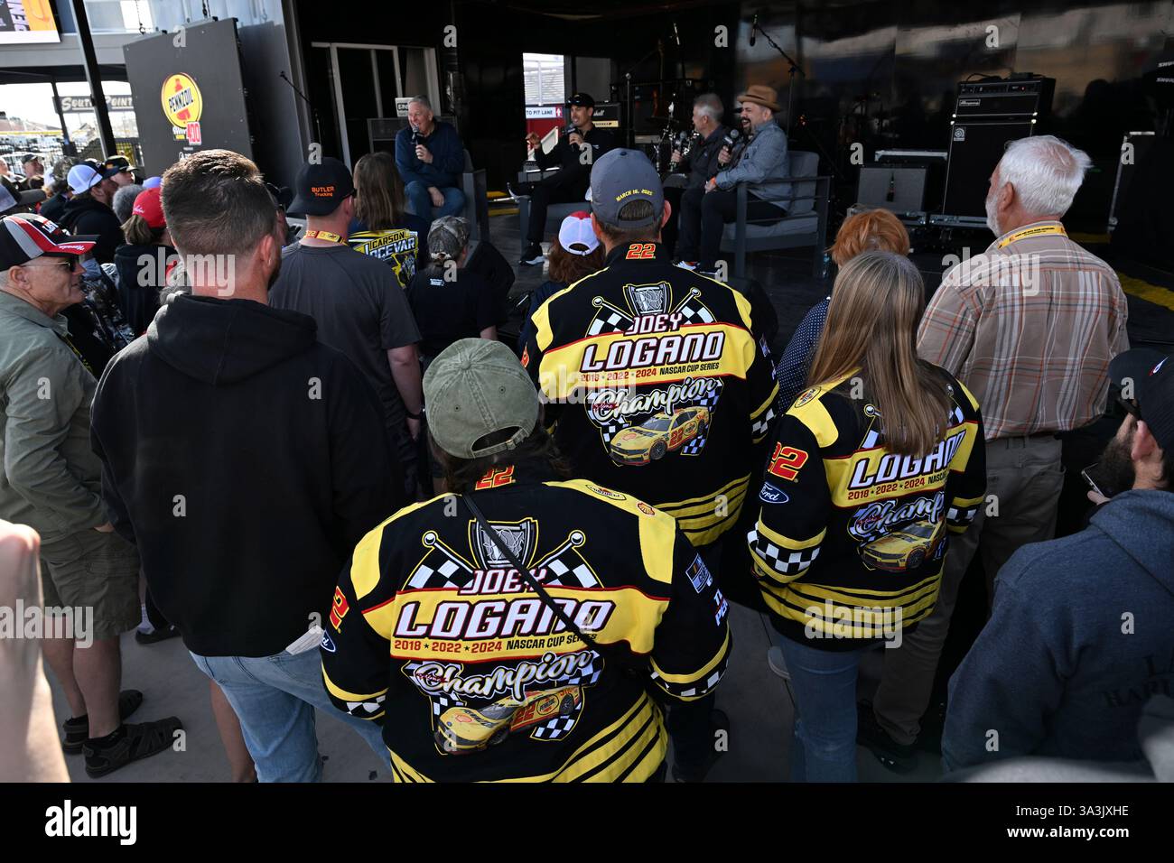 LAS VEGAS, NV - MARCH 16: A family of fans of Joey Logano watch as he ...