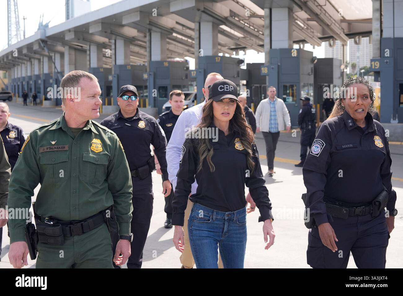 Homeland Security Secretary Kristi Noem, center, tours the San Ysidro ...