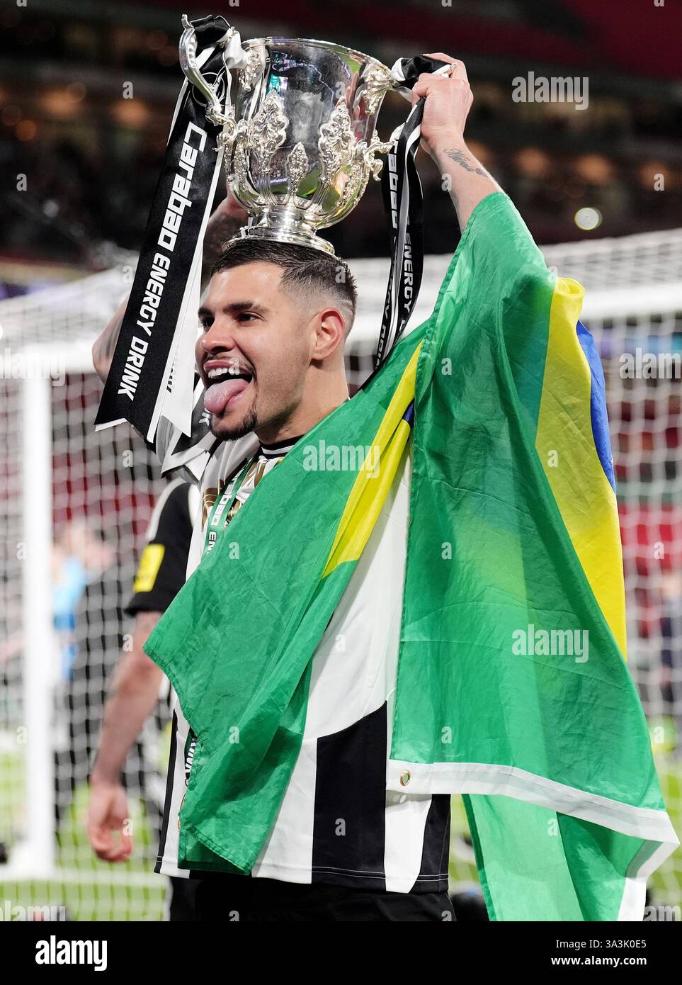 Newcastle United's Bruno Guimaraes celebrates with the trophy after ...