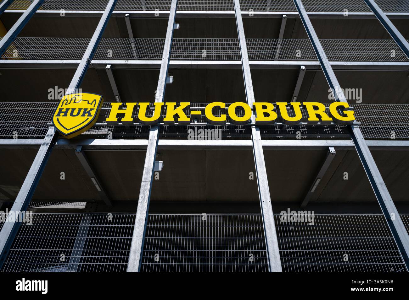 Coburg, Germany. 16th Mar, 2025. The HUK Coburg logo is emblazoned on a ...