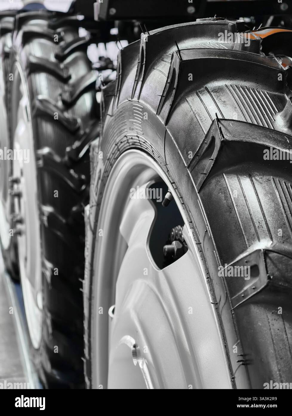 Close-up view of robust agricultural machinery wheels showcasing ...