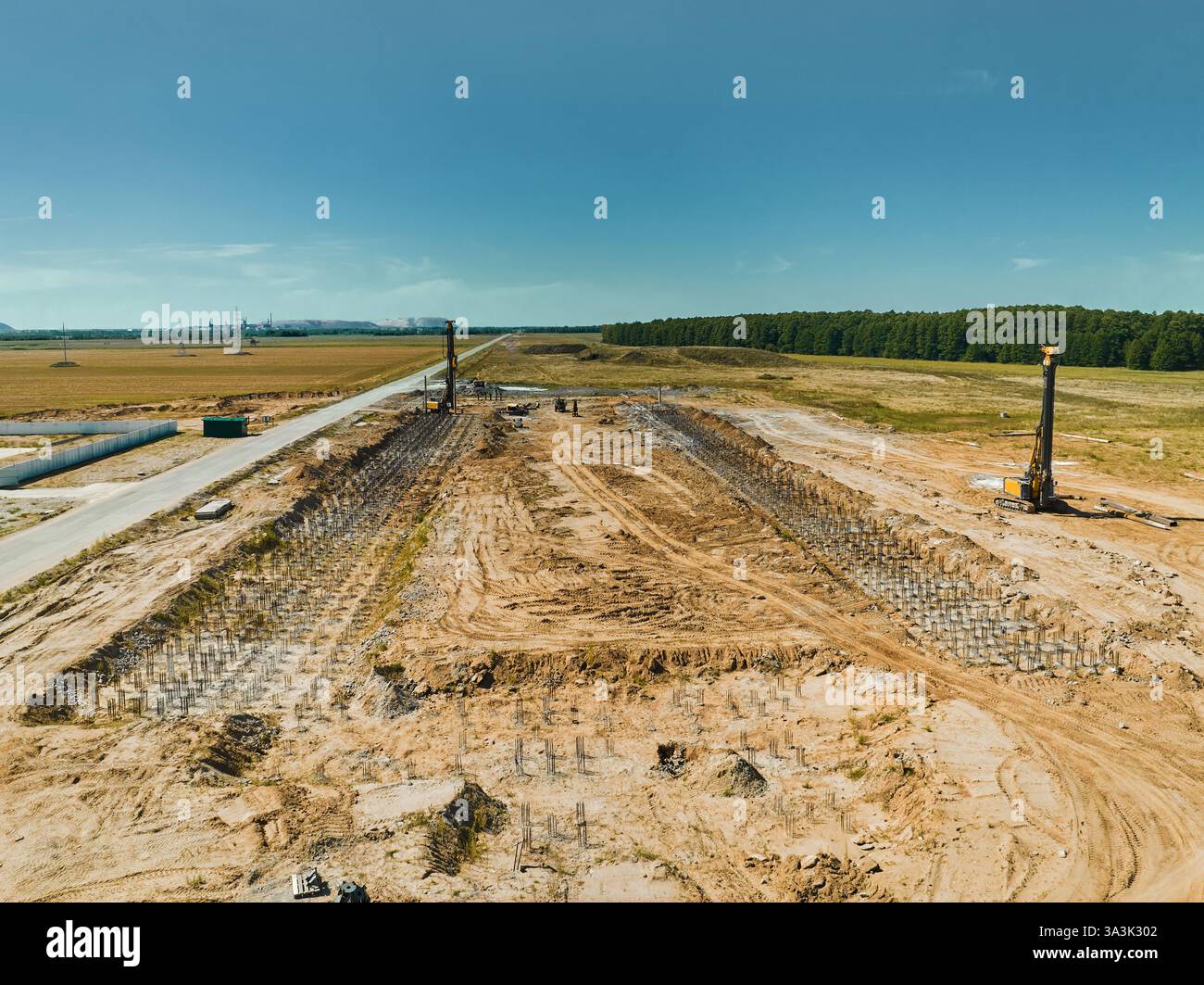 Empty pile field prepared for construction of new mine Stock Photo - Alamy