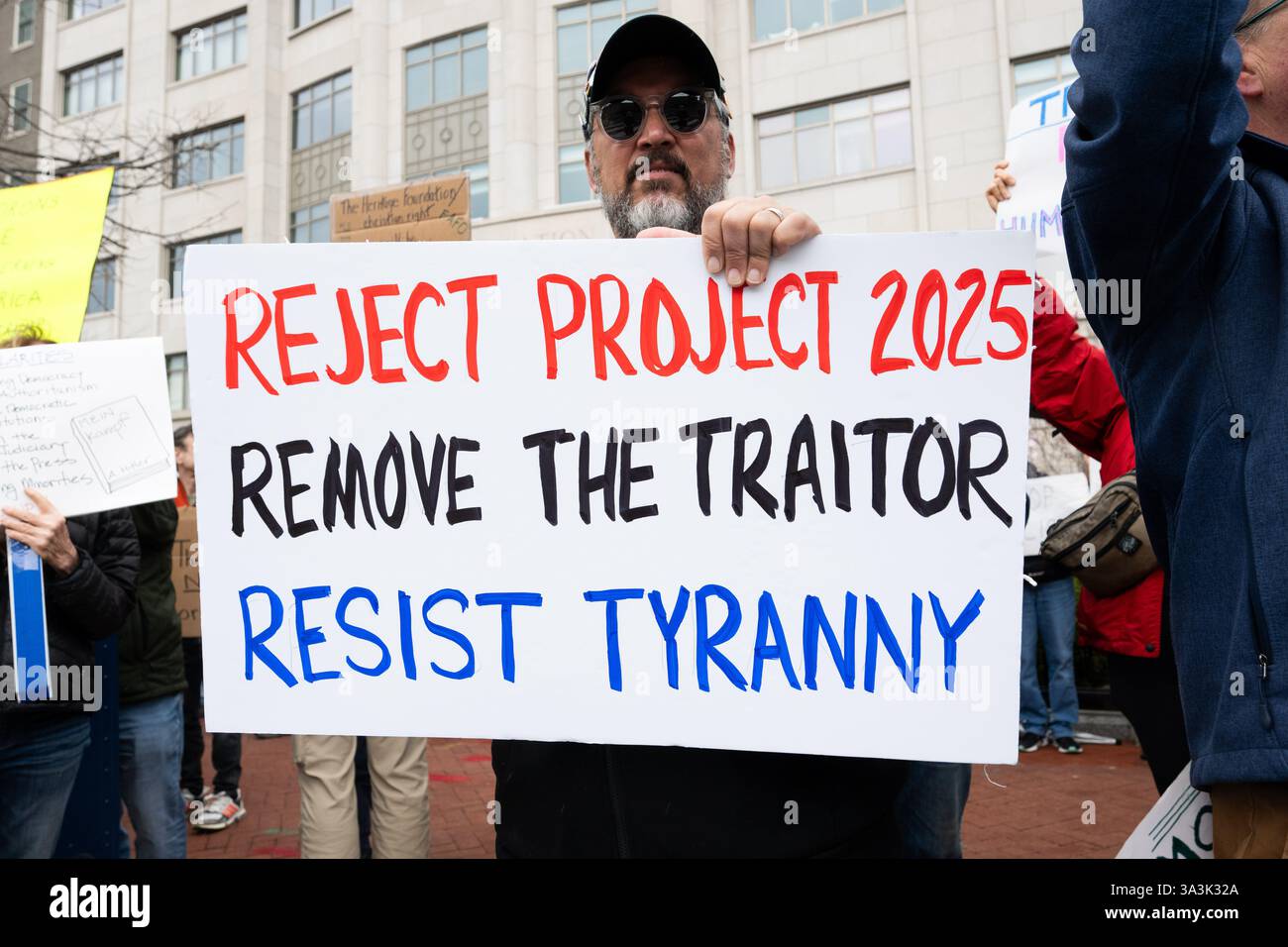 Washington, United States. 16th Mar, 2025. A person with a sign saying ...